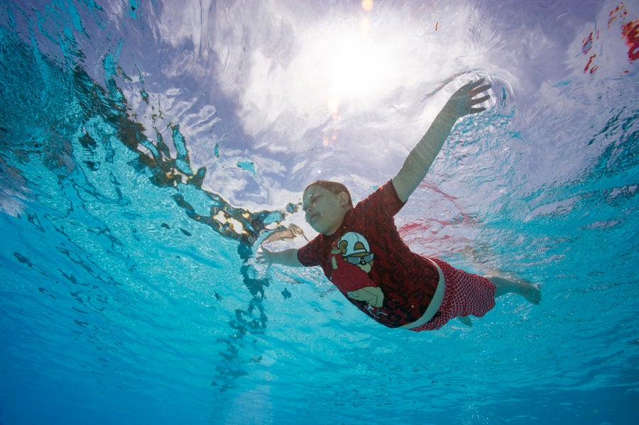Pool pix: Boston heads underwater to beat the heat