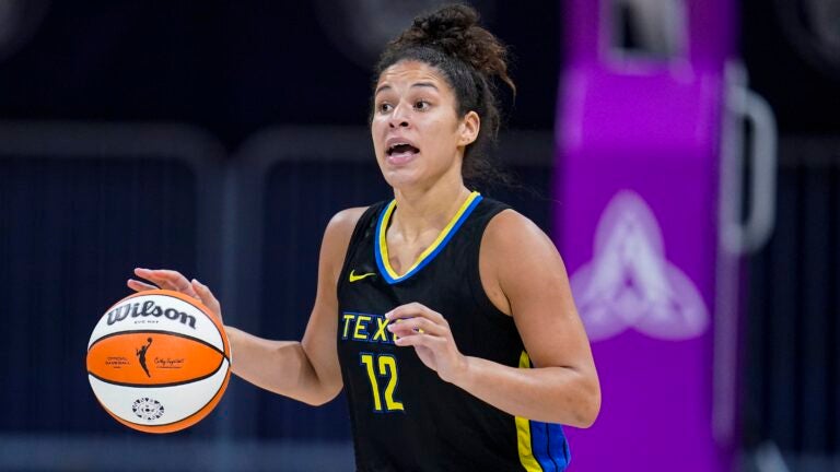 Newton's Veronica Burton helps Dallas Wings cement first playoff victory