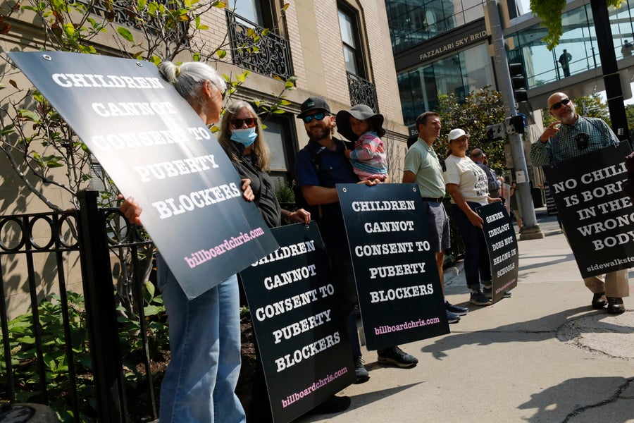 Fewer than 10 anti-trans protesters met by 100s of counter-protesters ...