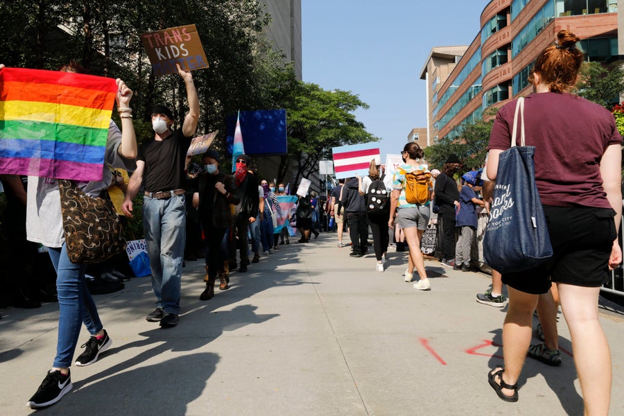 Fewer than 10 anti-trans protesters met by 100s of counter-protesters ...