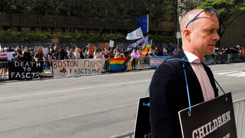 Fewer than 10 anti-trans protesters met by 100s of counter-protesters ...