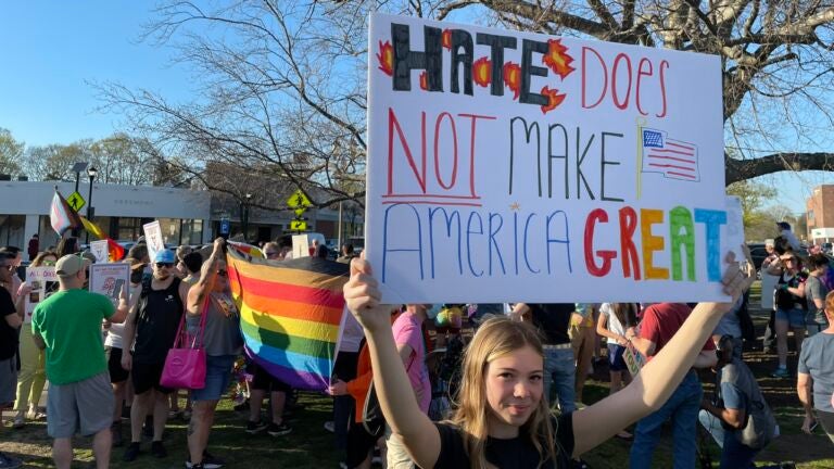 38 photos of the 'Straight Pride Parade' and counter-protests in Boston