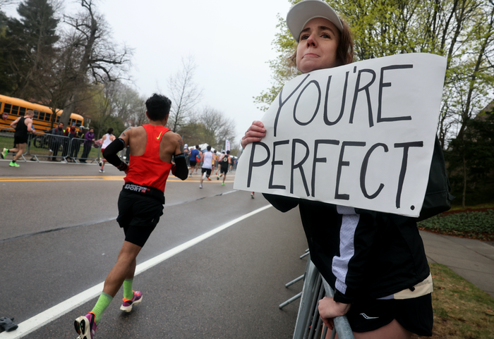 11 of the best signs spotted along the 127th Boston Marathon route ...