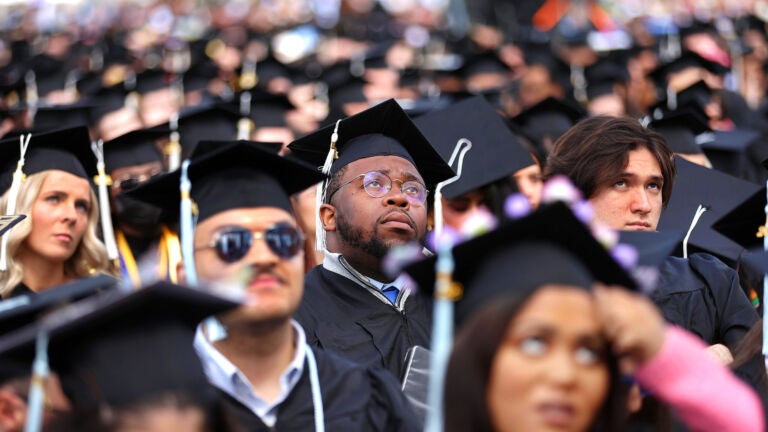 Billionaire surprises UMass Boston grads with $1,000 each at ...
