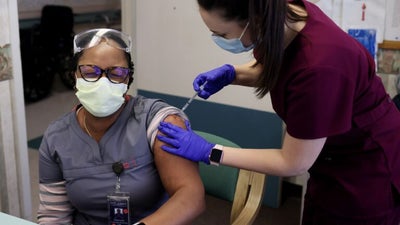 COVID, flu vaccination rules for health workers allow exceptions