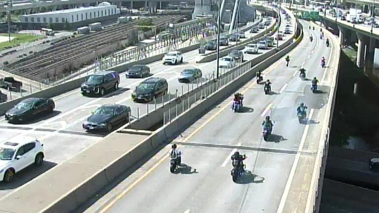 Motorcyclists, dirt bikers block Boston highway traffic to do donuts