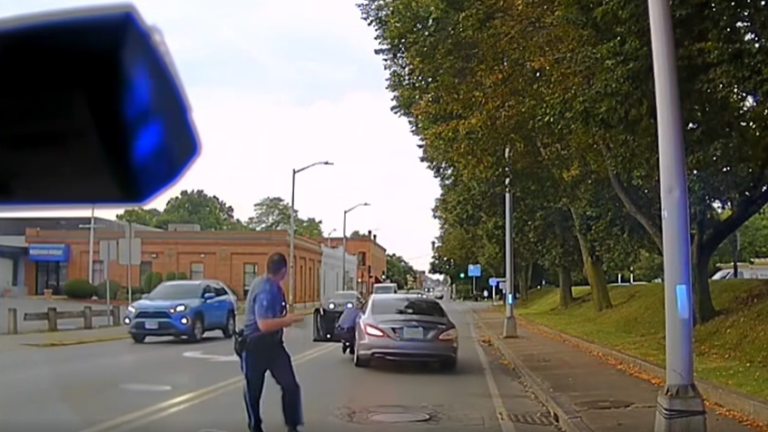 Video shows suspect drag Mass. state trooper during traffic stop
