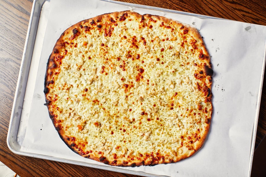 What is apizza? And where can you find it in the Boston area?