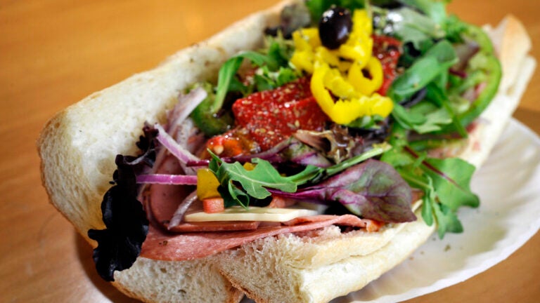 Why do some Bostonians call subs ‘spuckies’?