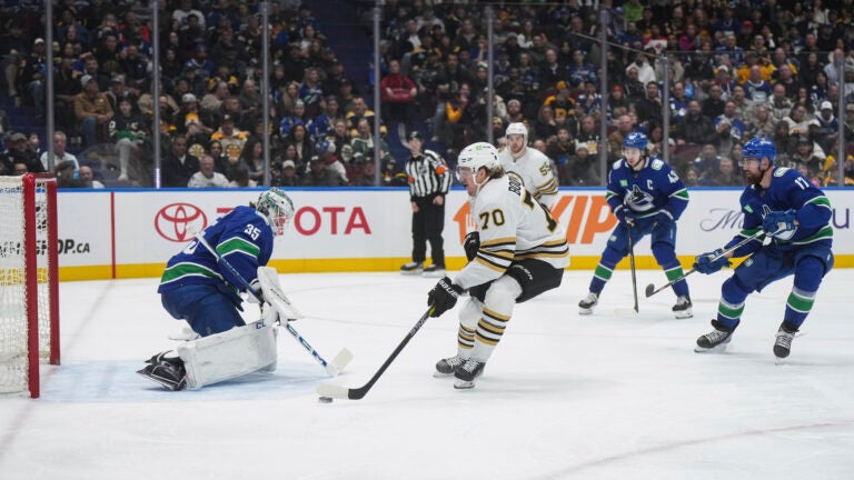 Brock Boeser scores 2 to lead Canucks to 3-2 overtime win over Bruins