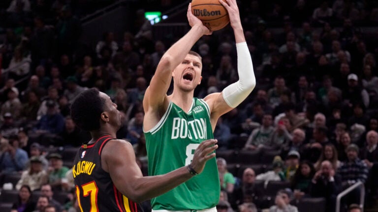Kristaps Porzingis, Derrick White lead Celtics to win over Hawks