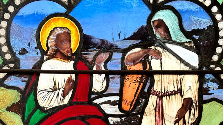 Stained glass window showing dark-skinned Jesus Christ heading to ...