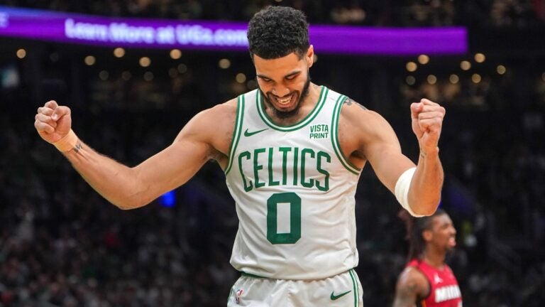 Jayson Tatum's triple-double, 3s lead Celtics past Heat 114-94 in Game 1