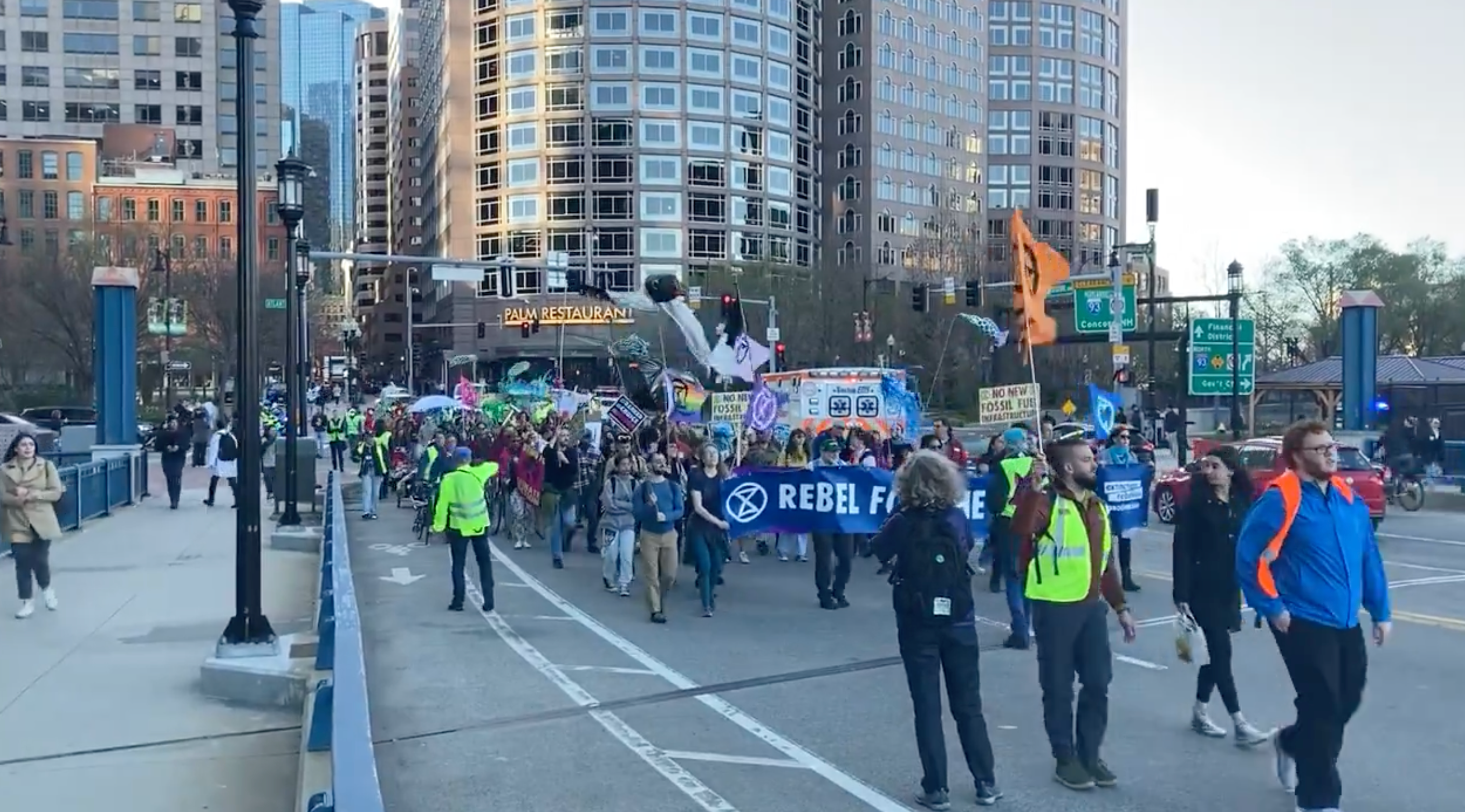 Climate activists block traffic on Moakley Bridge during evening rush hour