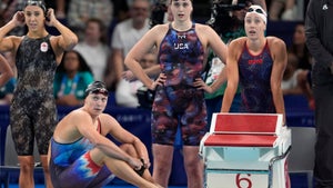 Katie Ledecky wins record 13th medal with a silver