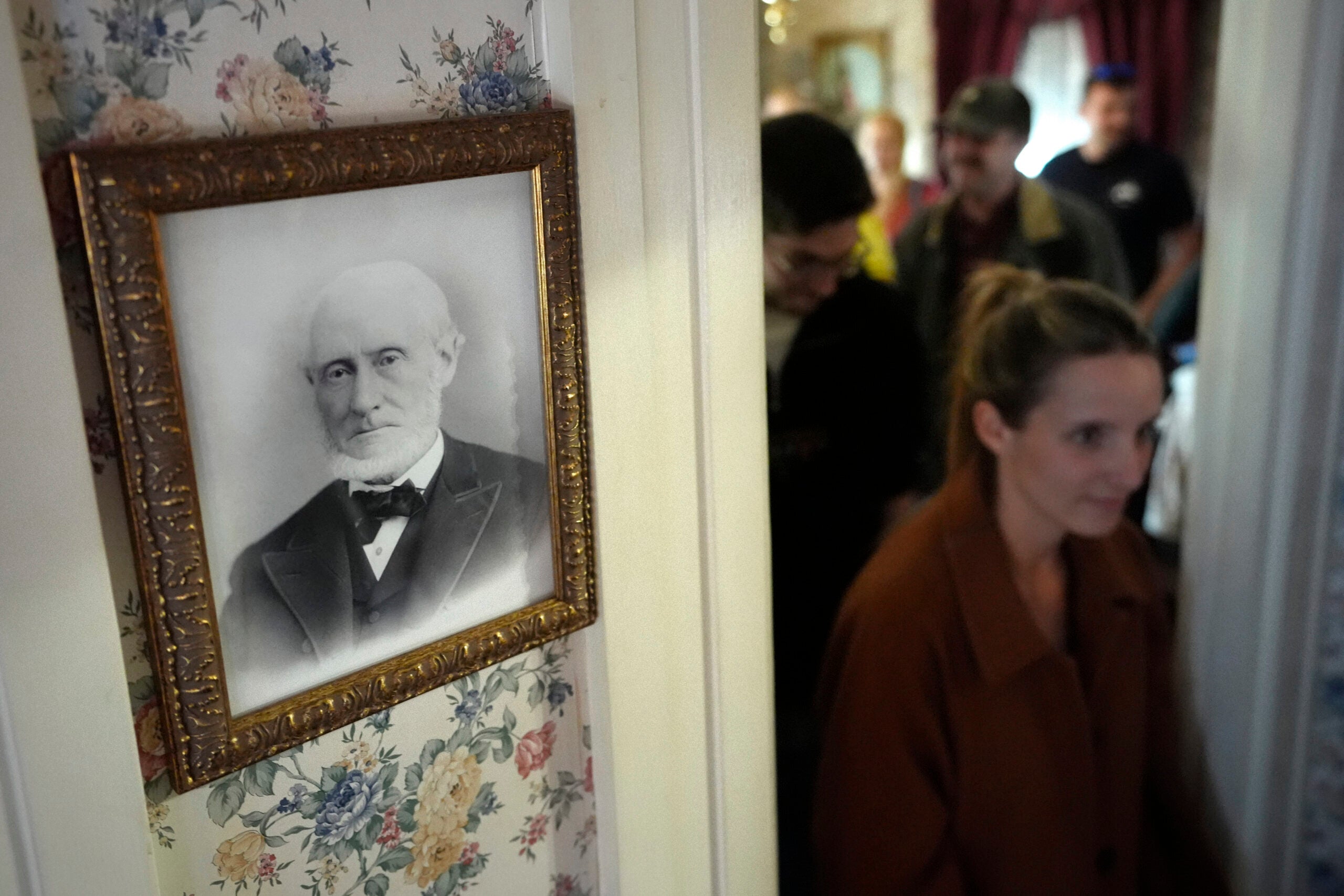 As Halloween approaches, tourists visit a Fall River home with a ...