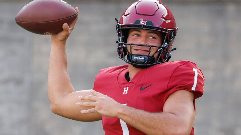 Harvard stops 2-point conversion to beat Holy Cross 35-34