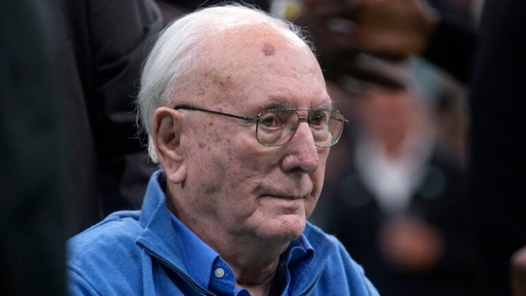 Bob Cousy receives a 2024 championship ring from the Celtics
