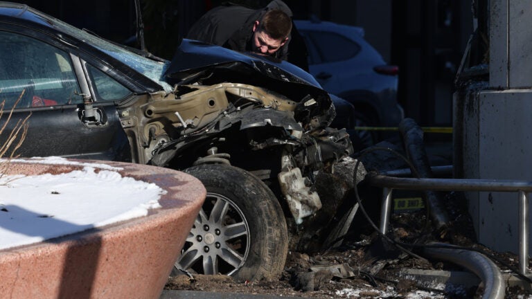 Car fatally strikes pedestrian, crashes into building in South Boston