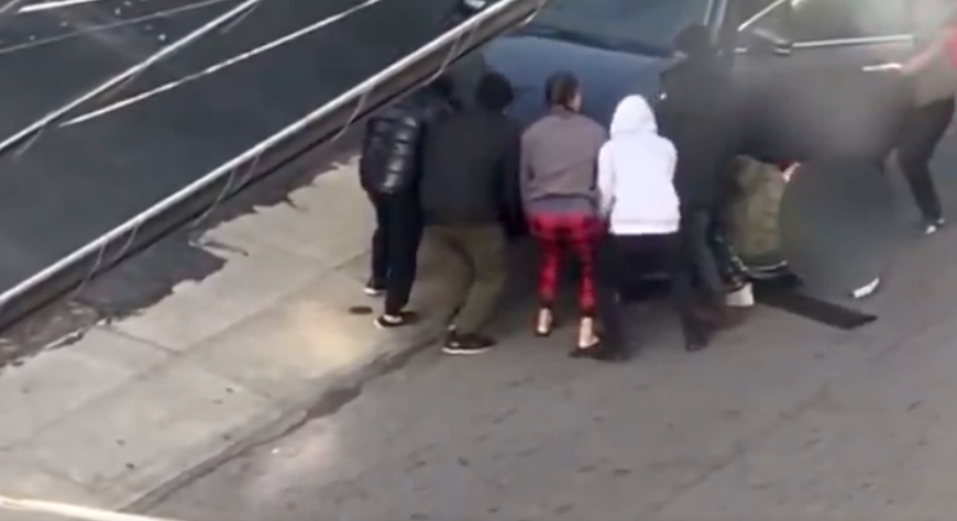 Lawrence residents lift car off woman pinned underneath