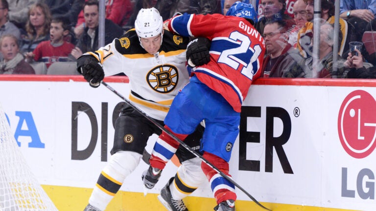 Former Bruin Andrew Ference gifts 'middle finger' glove to fan