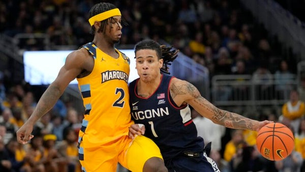Solo Ball's big night helps No. 25 UConn beat No. 9 Marquette