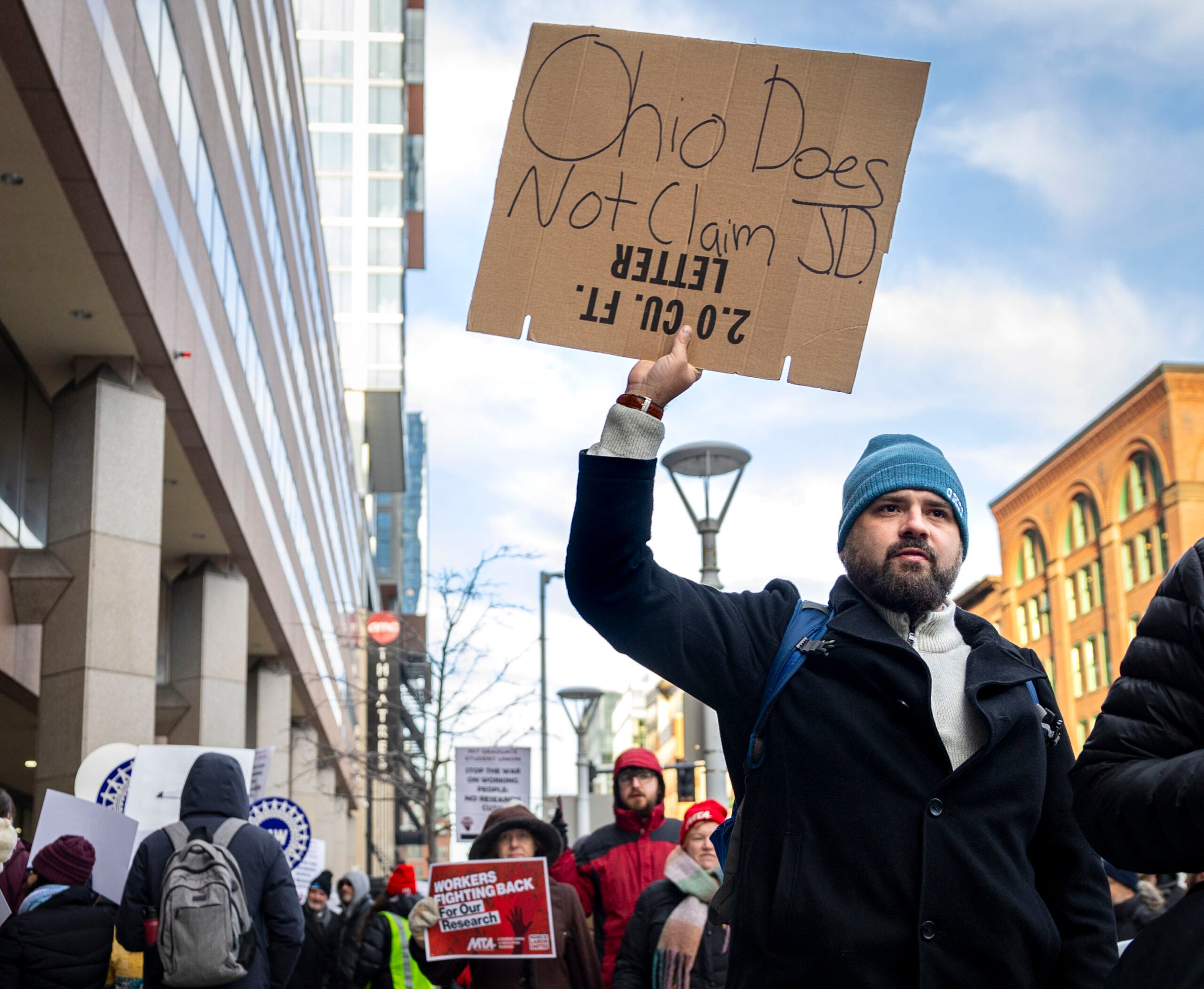 Photos: Protesters decry DOGE layoffs, budget cuts at Boston rally