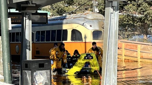 Neponset River floods Milton trolley station, passengers rescued by raft