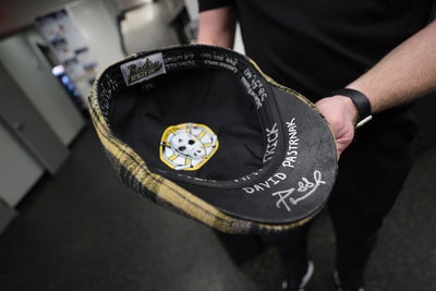 Scally caps and squid hats: Inside Bruins’ hat-trick trophy collection