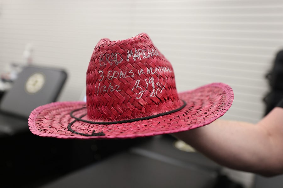 Scally caps and squid hats: Inside Bruins’ hat-trick trophy collection