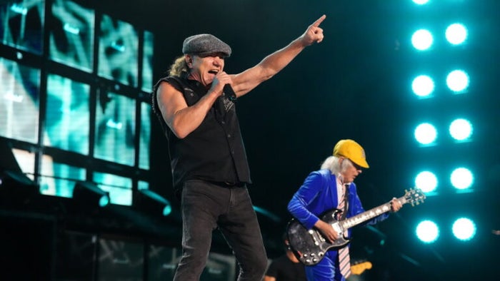 Review & setlist: Flawless backing band buoys a cheeky David Lee Roth ...