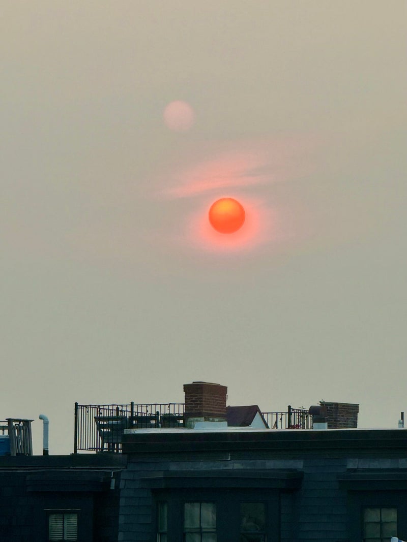 What Boston looks like under wildfire smoke — in photos