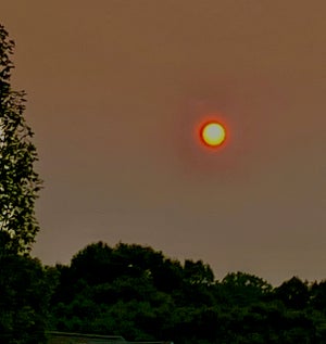 What Boston looks like under wildfire smoke — in photos