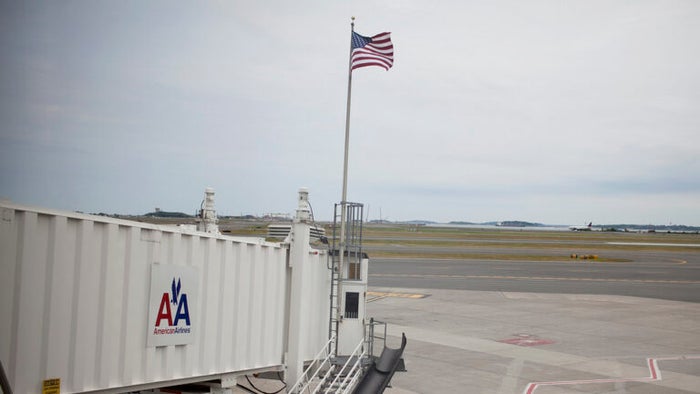 Why American flags fly above gates B32 and C19 at Logan Airport