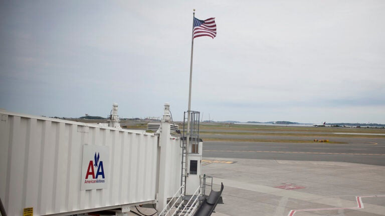Why American flags fly above gates B32 and C19 at Logan Airport