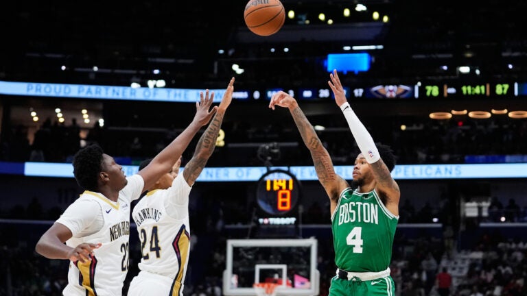 Simons, Celtics catch fire late, blow out Pelicans for first win