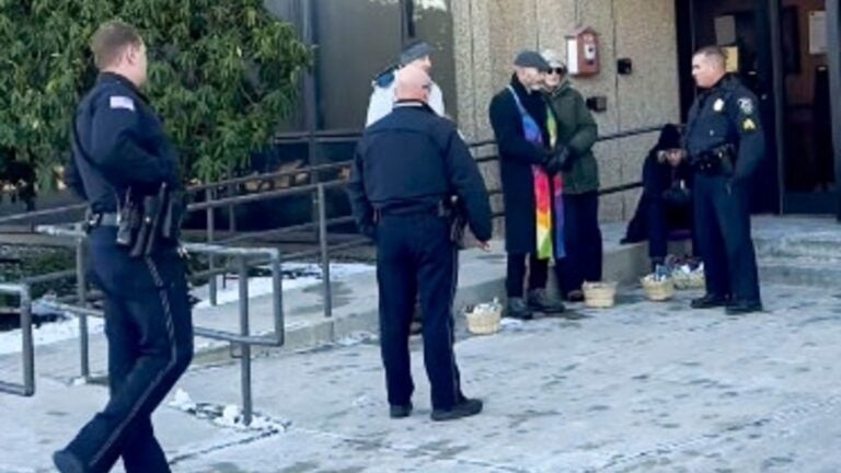 Four people, including Brandeis professor and local minister, arrested ...