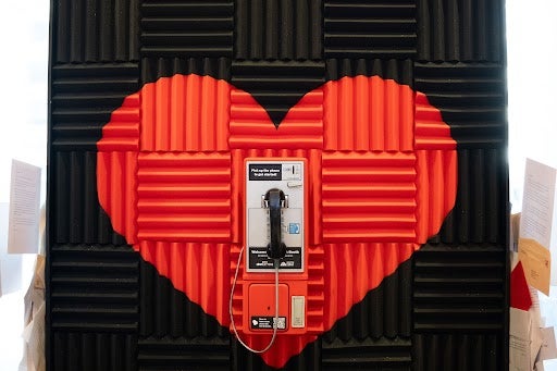 A Love Letters phone booth is at the Boston Public Library