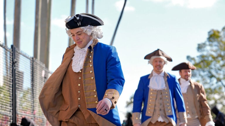 Bruins dress as colonial Patriots before Stadium Series game